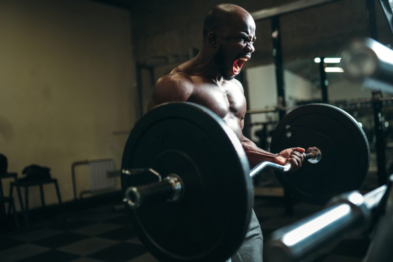 Heavy vs. High-Rep Lifting: How to Match Your Load to Your Goal ...